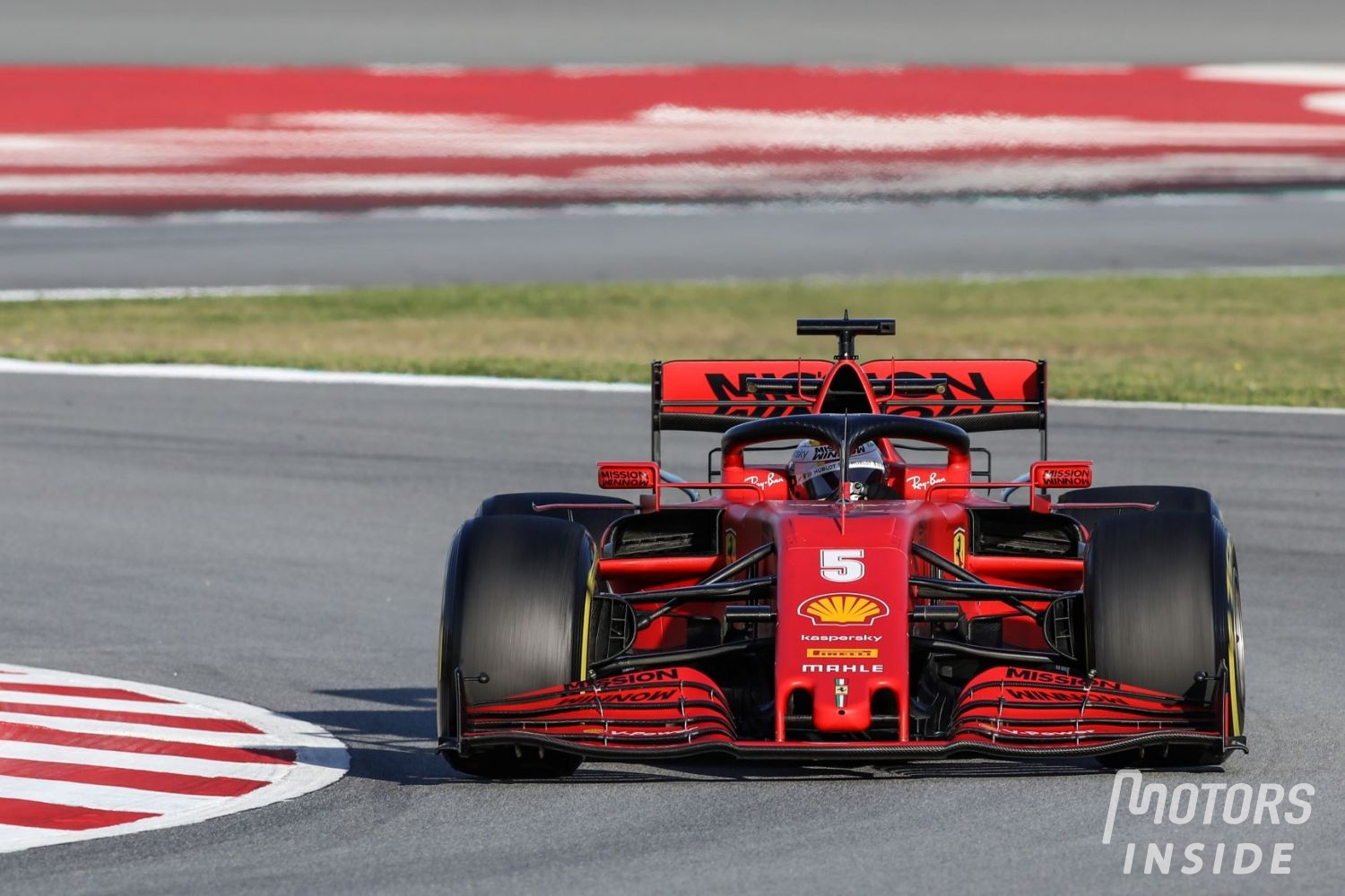 Sebastian Vettel faces the Ferrari wall - Magazine